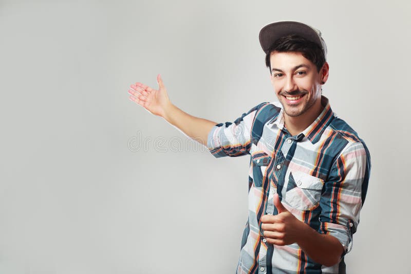 Young man presenting stock image. Image of posing, isolated - 94844365