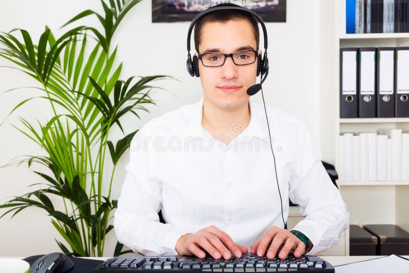 Young Man Providing it Support Stock Image - Image of working, computer ...