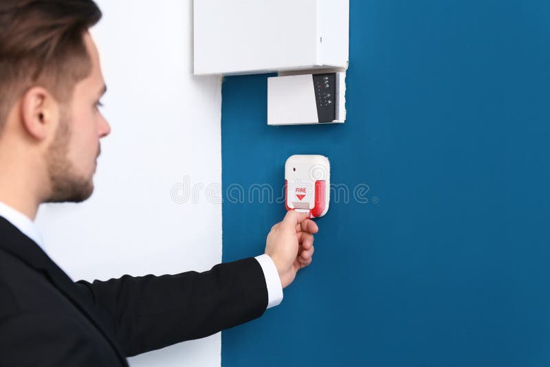 The Hand Of Man Is Pulling Fire Alarm Stock Photo - Image of pull ...