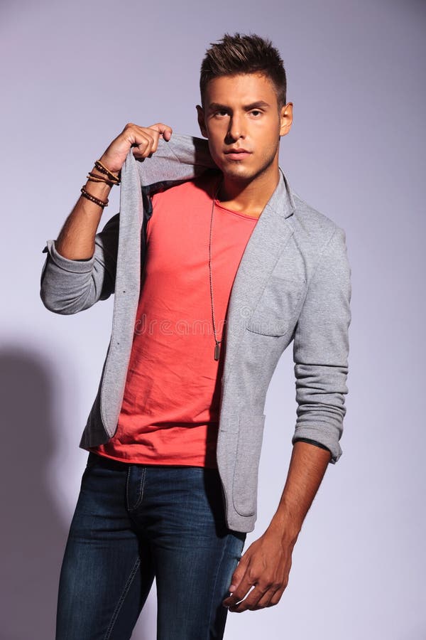 Attractive Young Man in Leather Jacket and Jeans in Front of Old Train ...