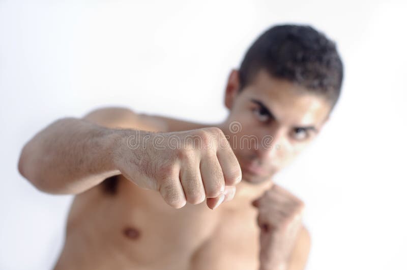 A Young Man Punches the Camera Stock Image - Image of space, sport ...