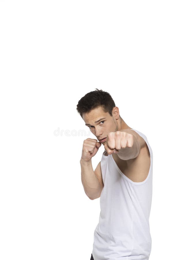 Young Man Punching stock photo. Image of muscle, boxing - 32047096