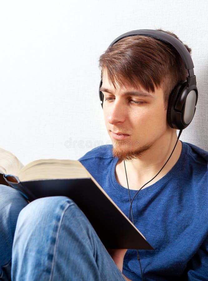 Young Man read a Book stock image. Image of person, large - 221419787
