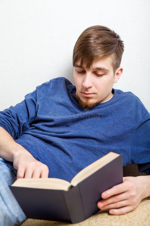 Young Man read a Book stock image. Image of indoor, caucasian - 170575691