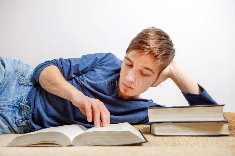 Young Man read a Book stock image. Image of education - 178692609