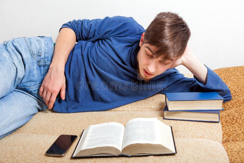 Young Man read a Book stock image. Image of home, dictionary - 191077511