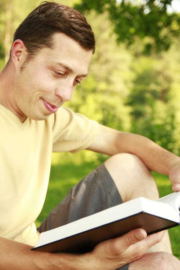 Young Man Reading the Bible Stock Photo - Image of books, study: 40034874