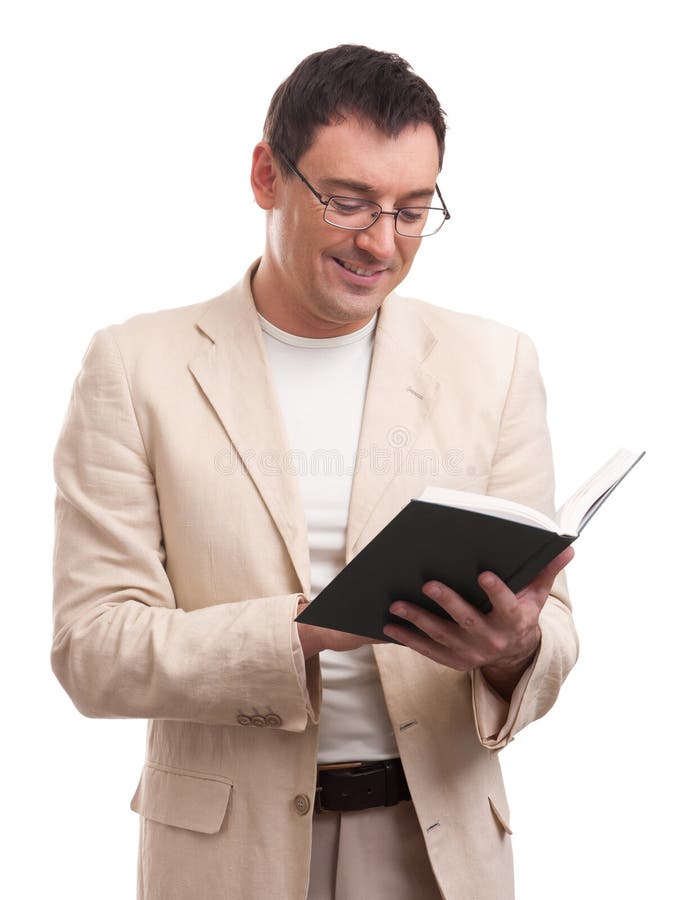 Young man reading a book stock photo. Image of student - 49780574