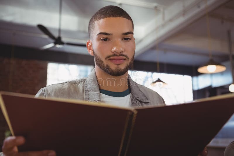 Man reading menu stock photo. Image of person, coffee - 99480362