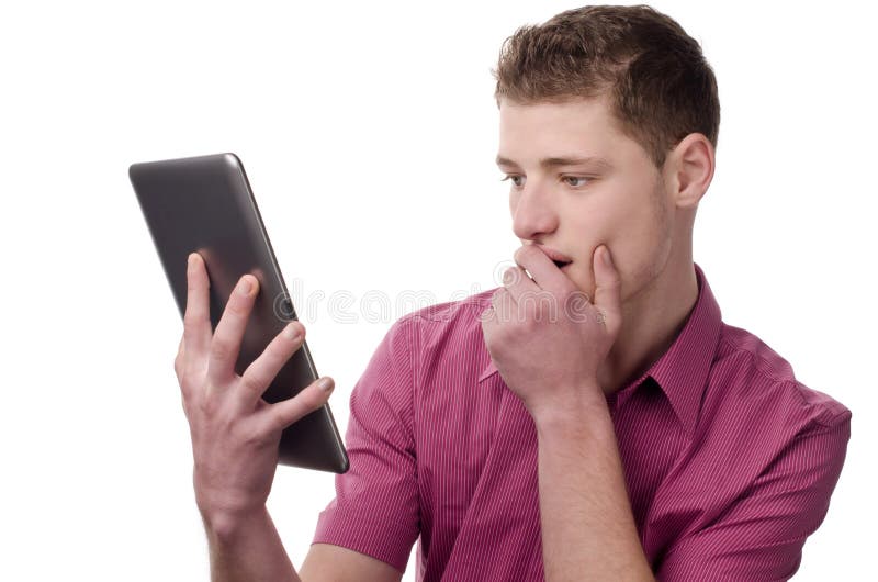 Young Man Reading a Shocking News on the Tablet. Stock Image - Image of ...