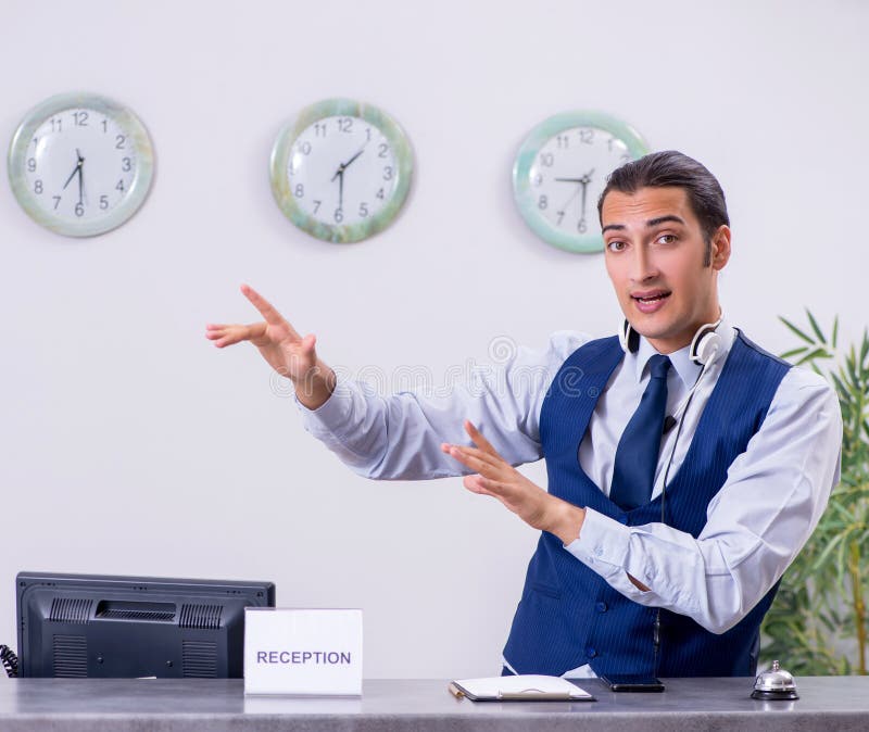 Young Man Receptionist at the Hotel Counter Stock Image - Image of ...