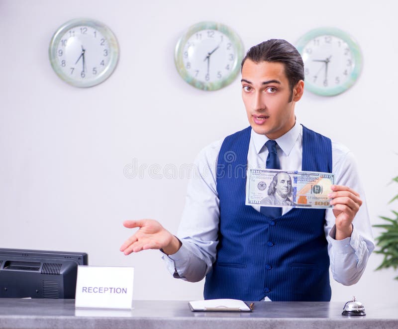 Young Man Receptionist at the Hotel Counter Stock Photo - Image of ...