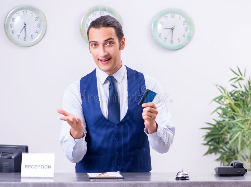 Young Man Receptionist at the Hotel Counter Stock Image - Image of ...