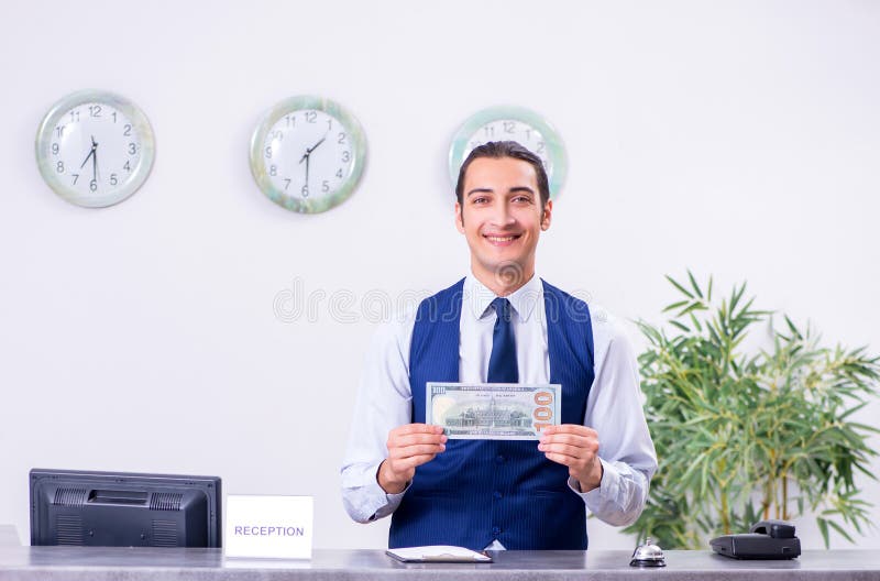 Young Man Receptionist at the Hotel Counter Stock Image - Image of ...