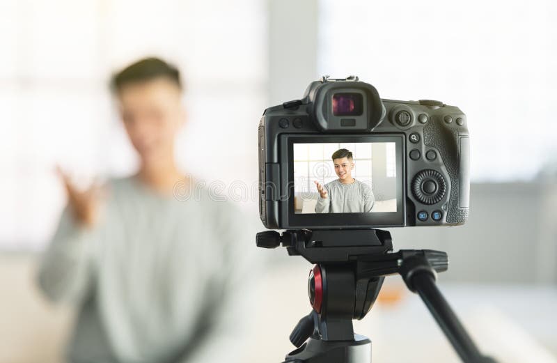 Young Man Recording Video for an Internet Reportage or Tutorial ...