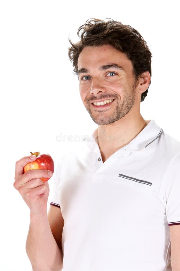 Young man with a red apple stock image. Image of charming - 34036345