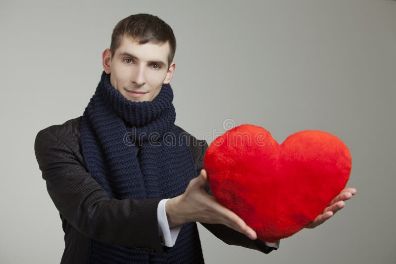 A Young Man with a Red Heart Stock Image - Image of young, family: 49679205