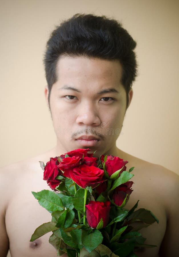 Young man and red rose stock image. Image of bouquet - 56251617