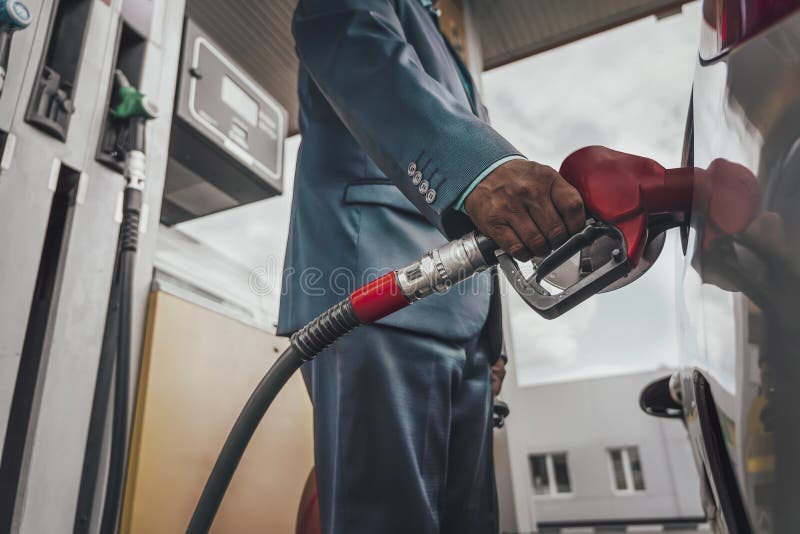 Young Man Refuelling His Modern Car at Petrol Station Stock Image ...