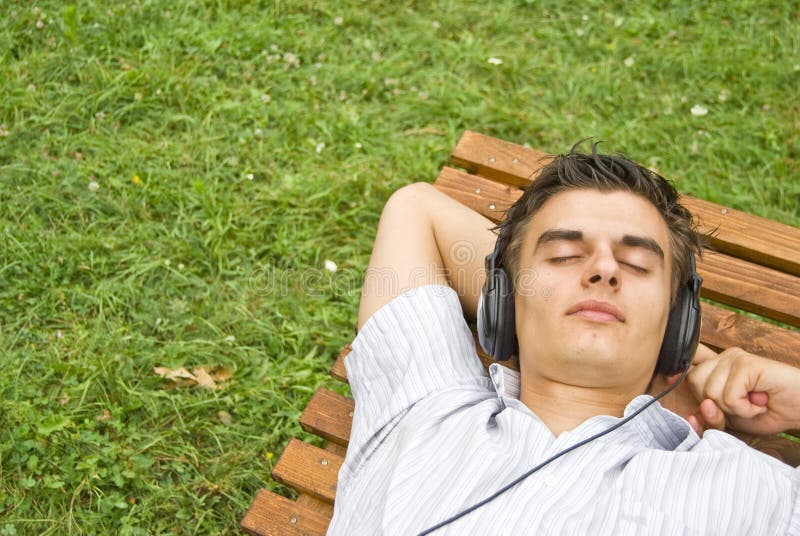 Young man relaxing stock image. Image of working, wireless - 10416649