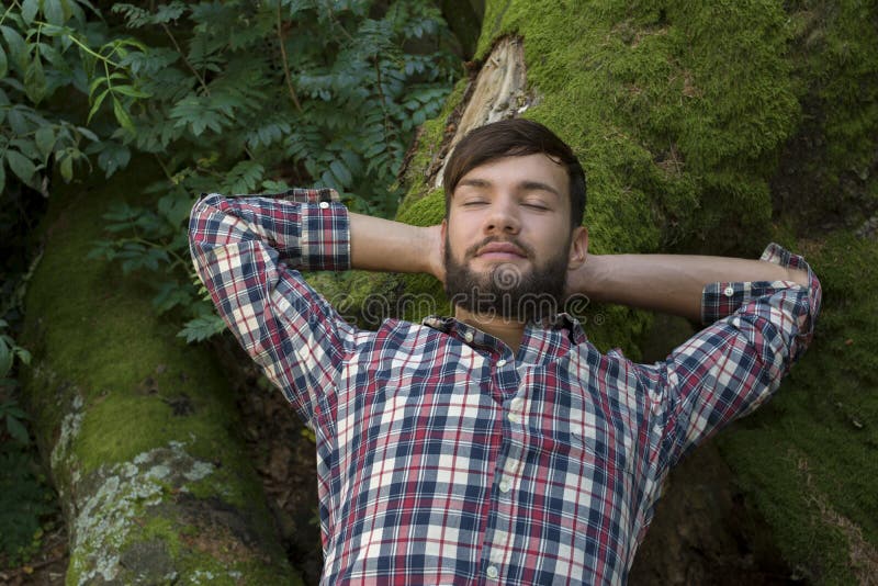 Young Man Relaxing in Nature Stock Photo - Image of hiking, meditation ...