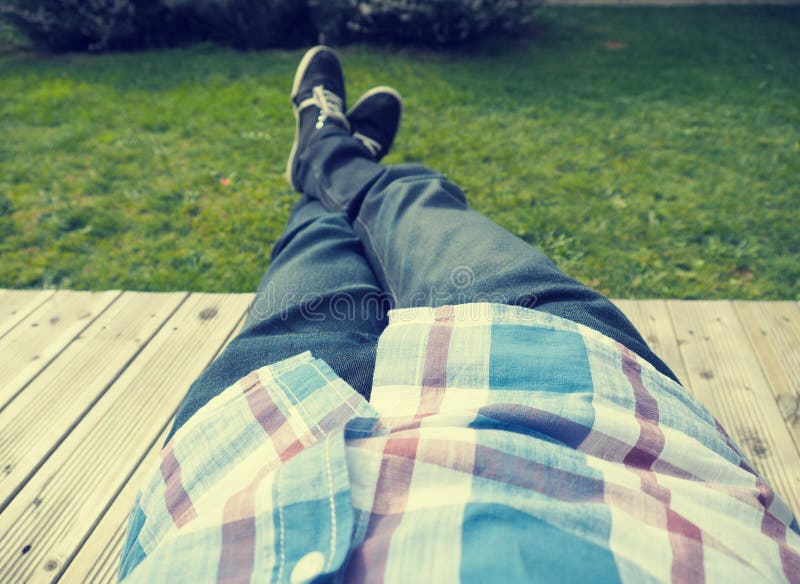 Young man relaxing stock photo. Image of wooden, terrace - 97004136