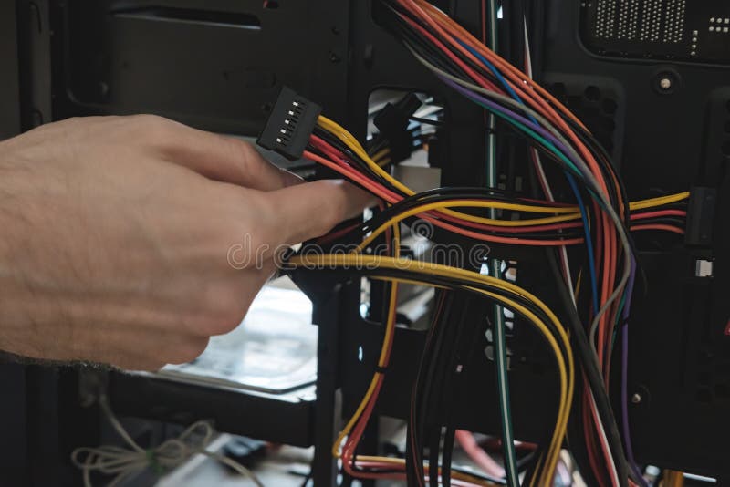 Young Man Repairs a Computer System Unit, Changes Parts, Video Card and ...