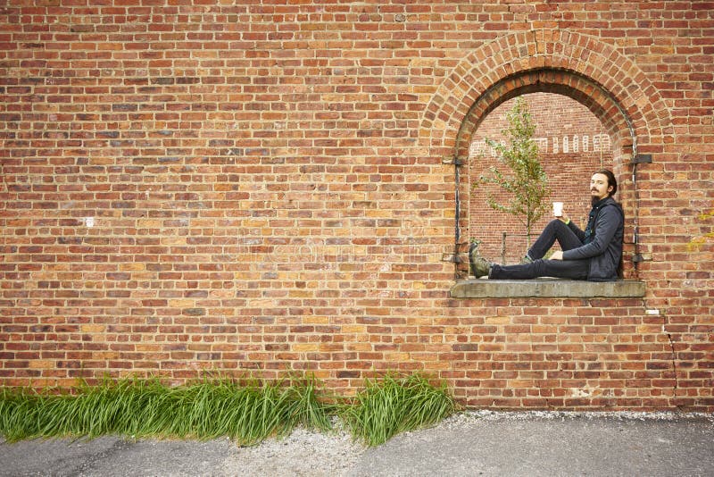 Young man rest with coffe stock photo. Image of city - 99247192