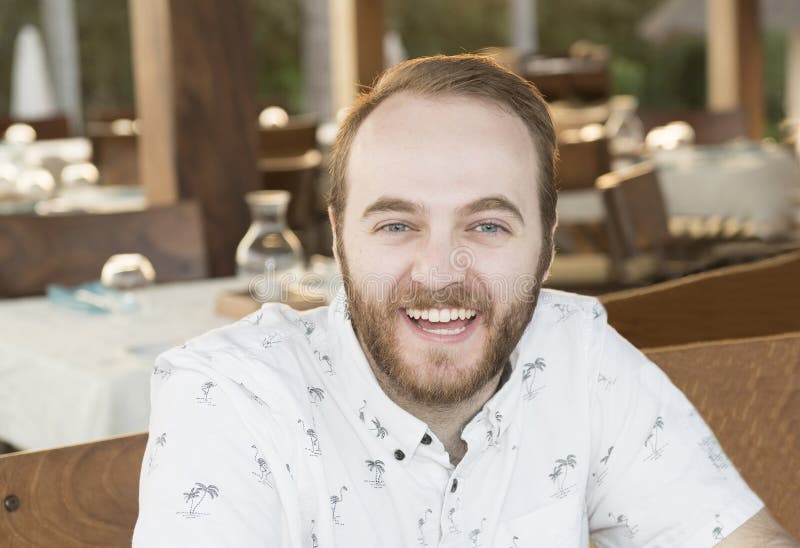 Young Man at Restaurant Smiling Broadly at the Camera Stock Image ...