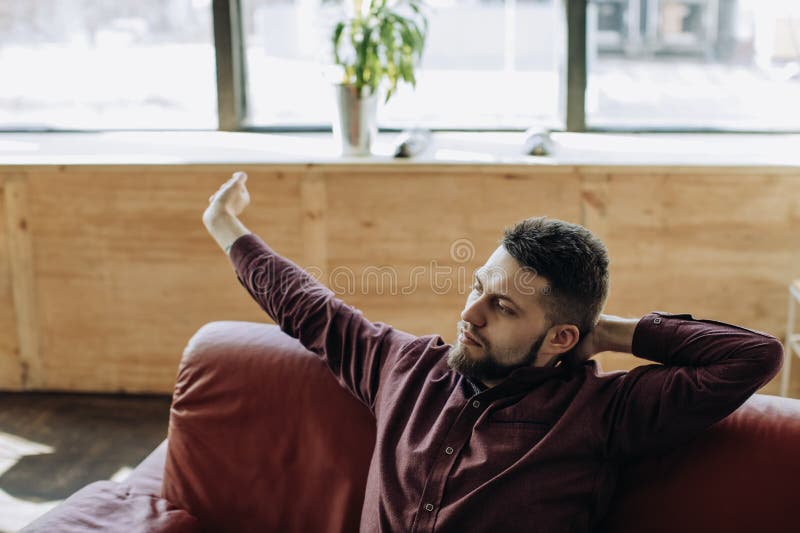 Young Man Resting after Hard Work Stock Image - Image of indoors, work ...