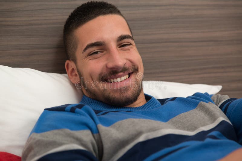 Young Man Resting Peacefully in His Own Bed Stock Image - Image of ...