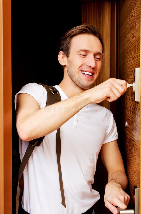 Young Man Returning Home from Work or Trip Stock Image - Image of ...