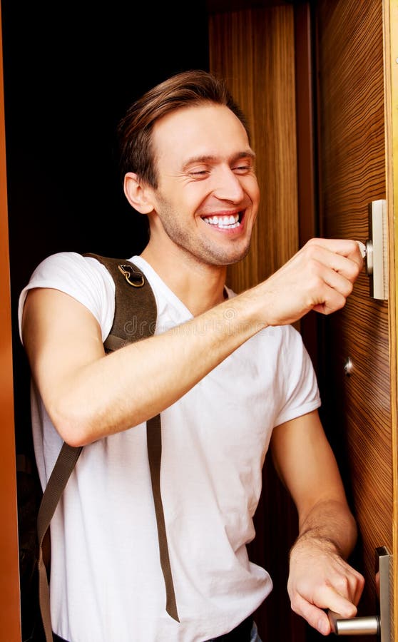 Young Man Returning Home from Work or Trip Stock Photo - Image of ...