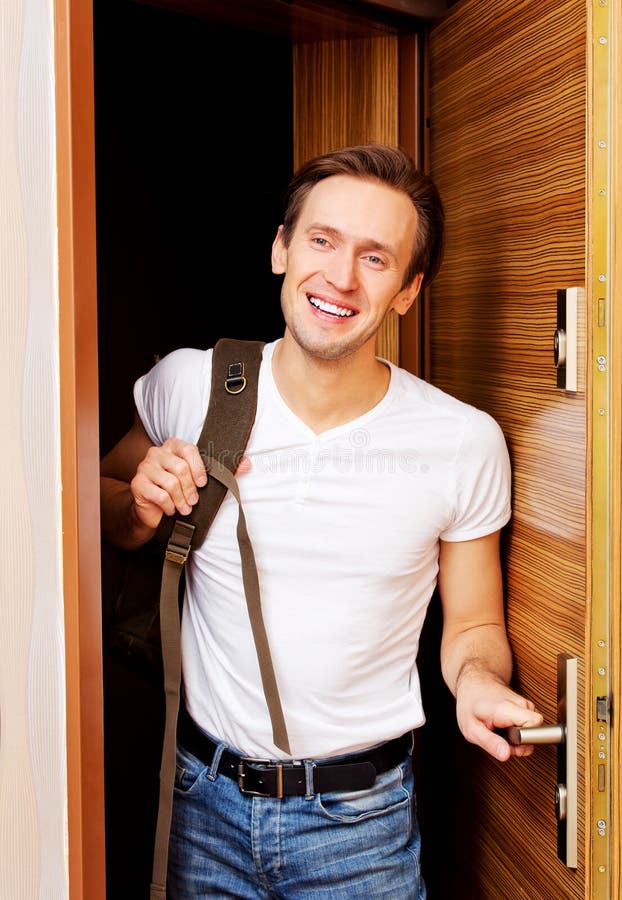 Young Man Returning Home from Work or Trip Stock Photo - Image of ...