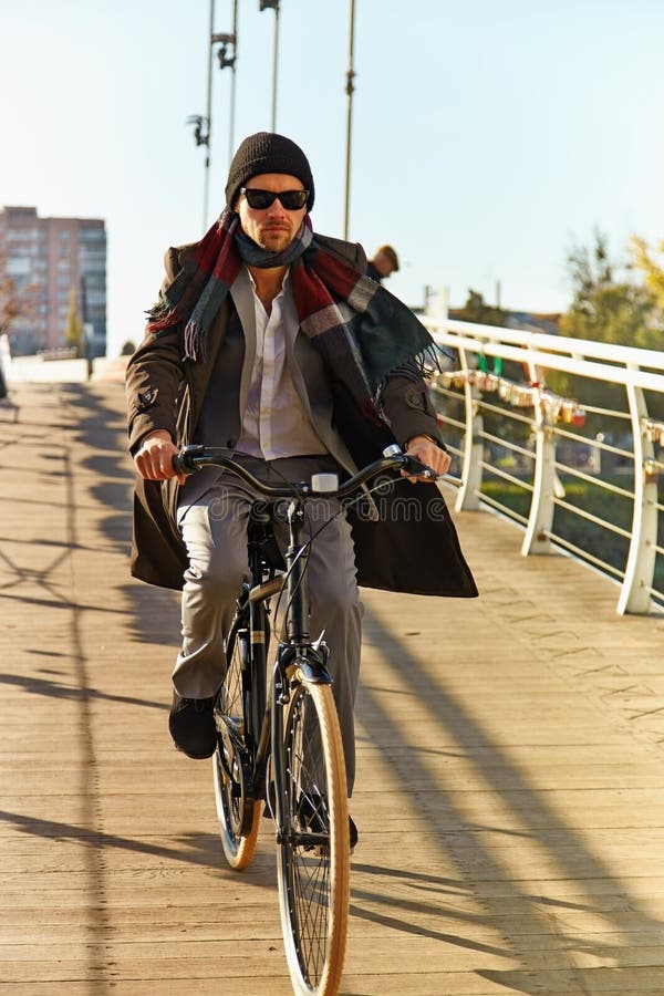 Young man riding a bicycle stock photo. Image of bicycle - 37803504