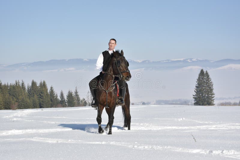 Young Man Riding Horse Outdoor in Winter Stock Image - Image of ... Young Man Riding Horse Outdoor in Winter Stock Image - Image of ...