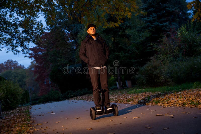 Young Man Riding Hoverboard Stock Image - Image of electrical, board ...