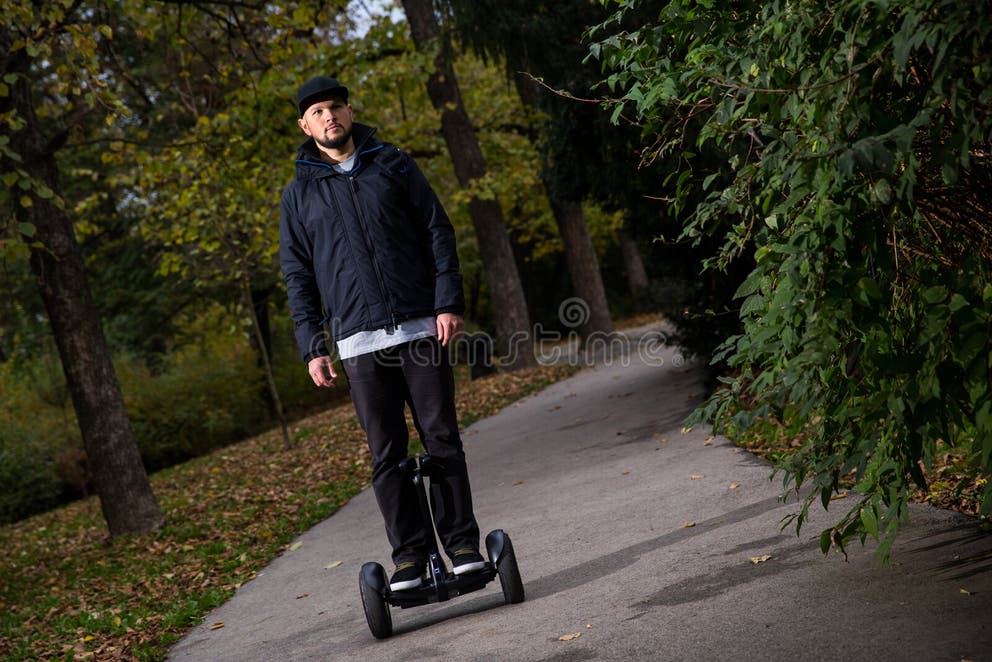 Young Man Riding Hoverboard Stock Photo - Image of transport, park ...