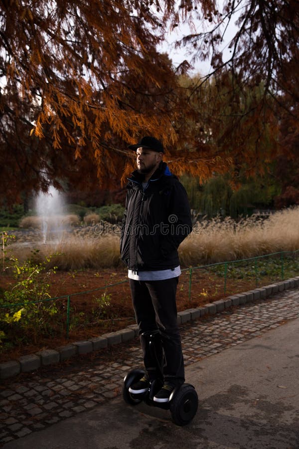Young Man Riding Hoverboard Stock Image - Image of evening, gyro: 80472517