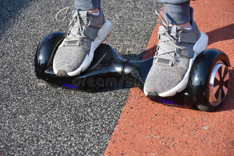 Young Man Riding on the Hoverboard in the Park Stock Image - Image of ...