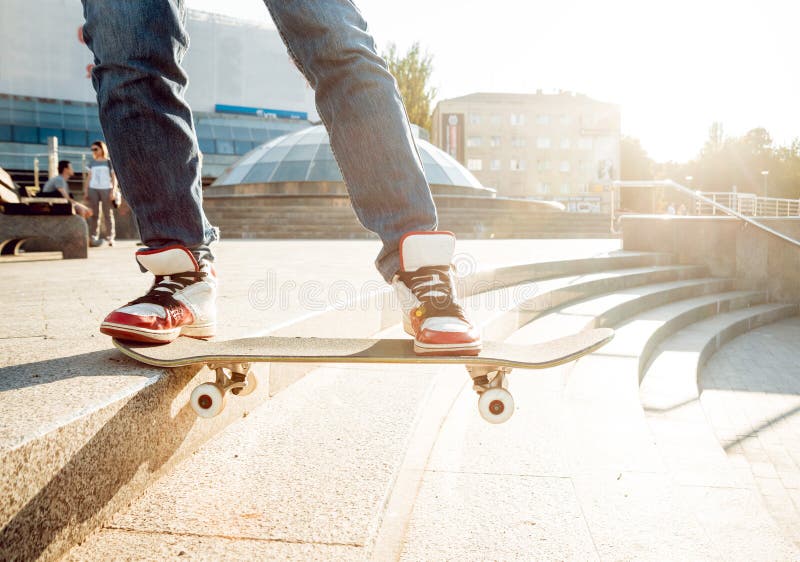 Young Man Riding a Skateboard. Town Square. Stock Photo - Image of ...