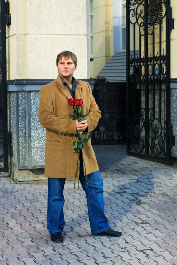 Young man with a roses. stock photo. Image of date, romance - 11948504