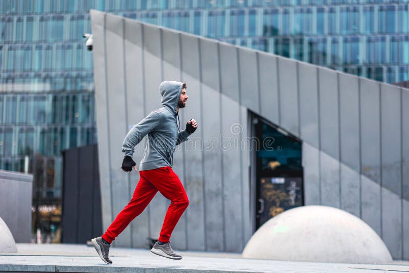 Young Man Running in the City Stock Image - Image of handsome, jogger ...