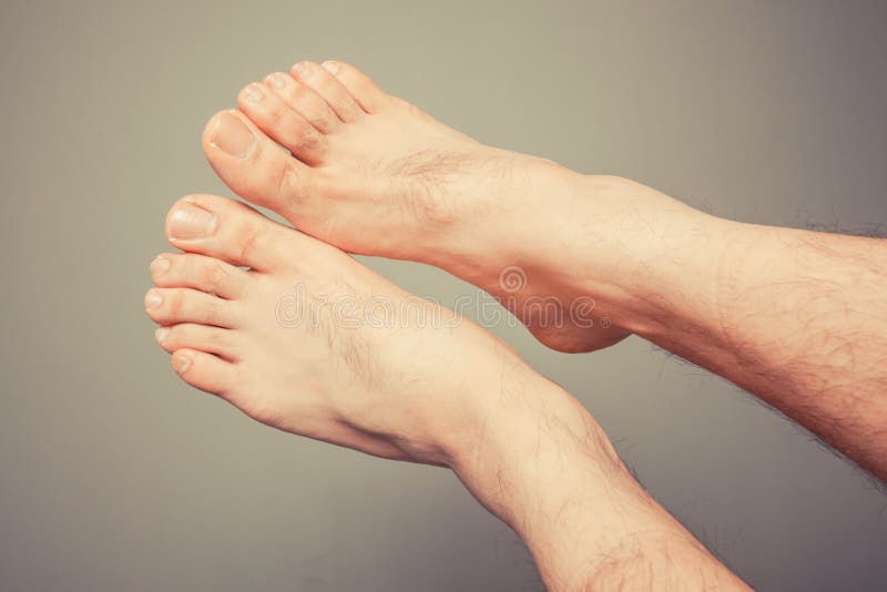 Young man's feet stock photo. Image of adult, white, person - 39949244