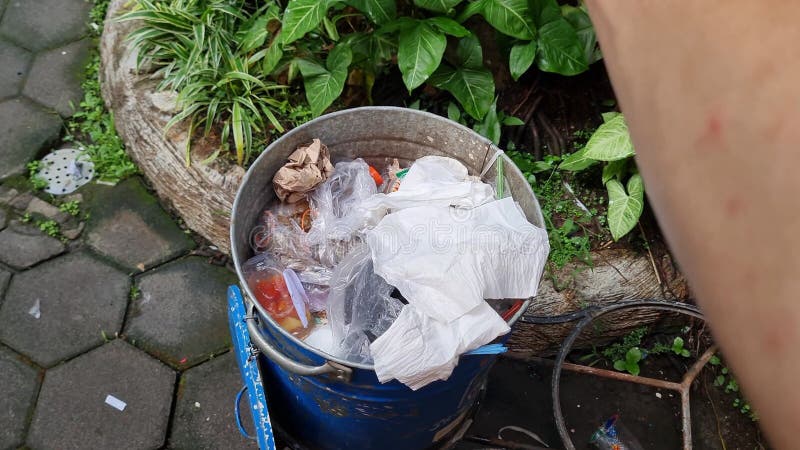 Young Man S Hand Movement Throwing Rubbish into the Trash Can Stock ...
