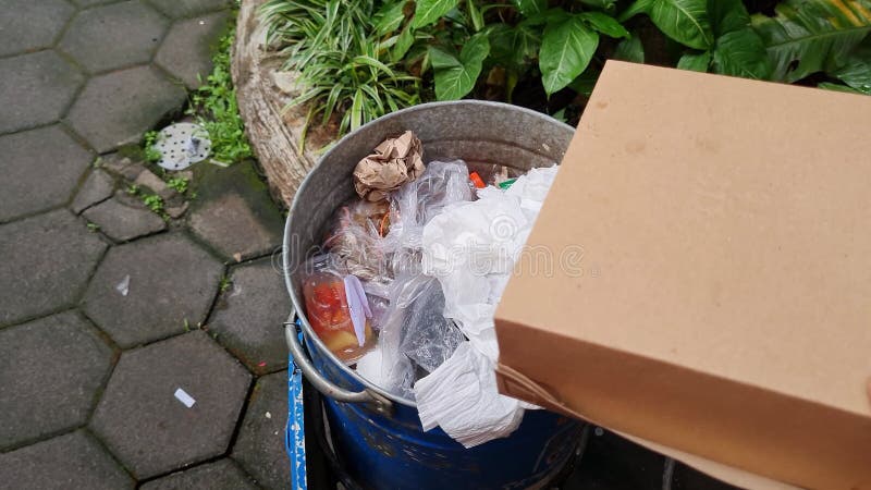 Young Man S Hand Movement Throwing Rubbish into the Trash Can Stock ...