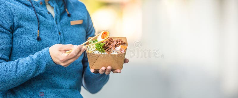 Young Man`s Hands Holding Lunch in a Box of Recycled Paper Stock Image ...