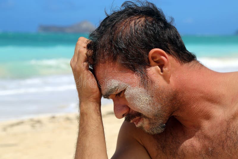 Young Man with Sand on Face by Beach Stock Photo - Image of cute ...