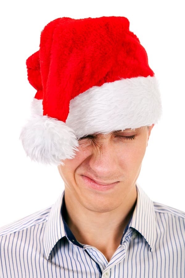Young Man in Santa Hat stock photo. Image of aversion - 78908668