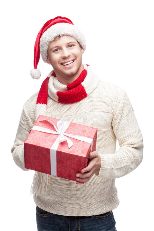 Young Man in Santa Hat Holding Big Red Christmas G Stock Image - Image ...